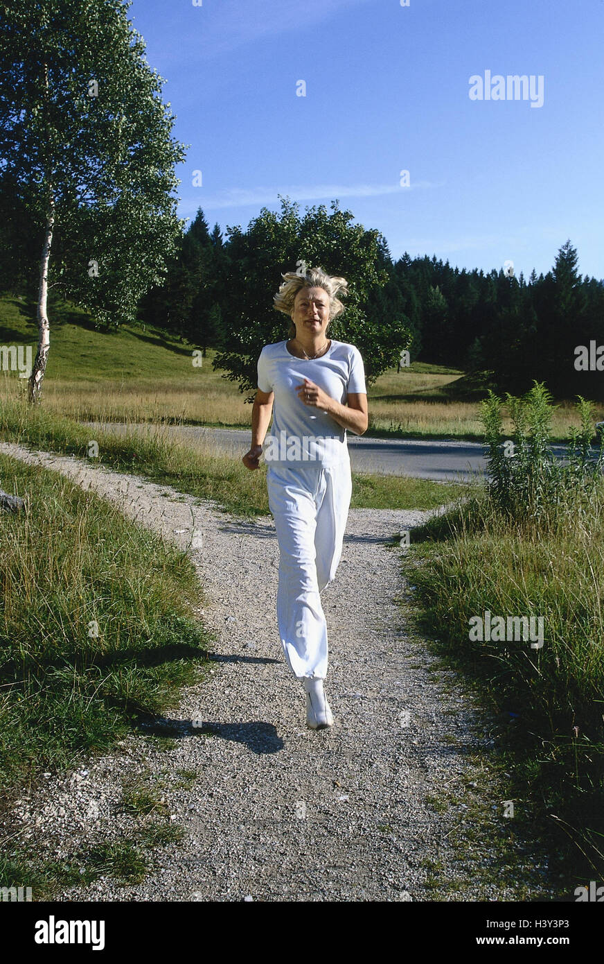 Forest way, woman, jog, model released run outside, middle old person ...