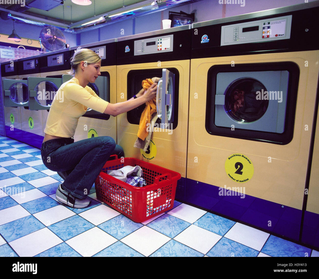 Launderette, woman, young, washing machine, coin laundry, coin ...