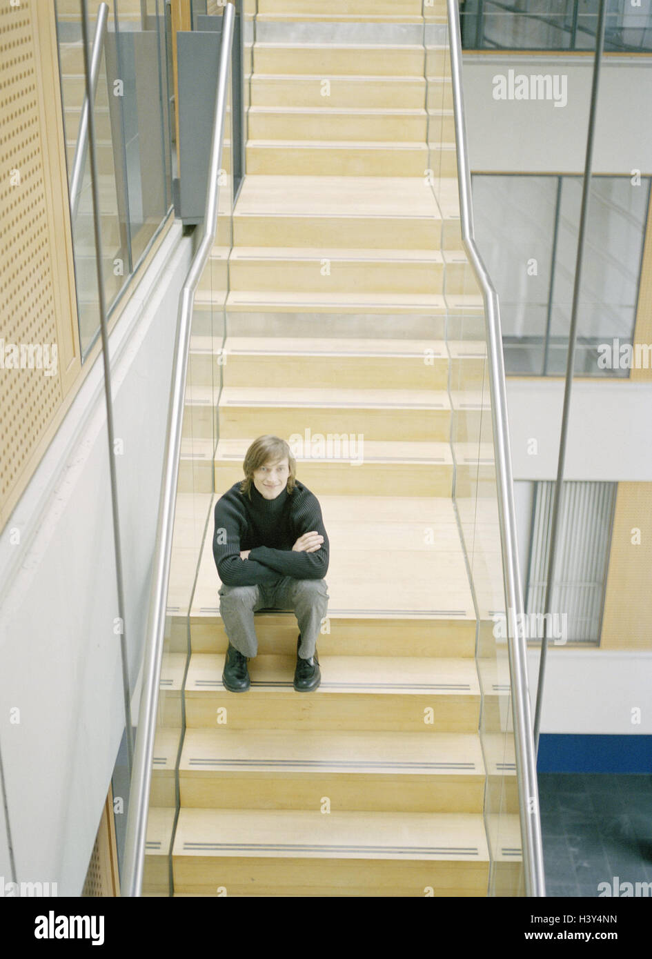 Buildings, hall, stairs, man, sit, wait contently, happy, business ...