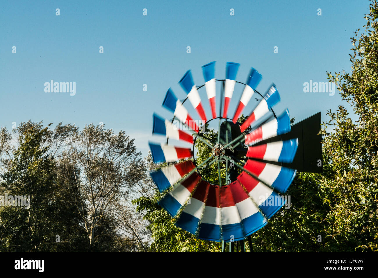 A wind turbine turning Stock Photo - Alamy