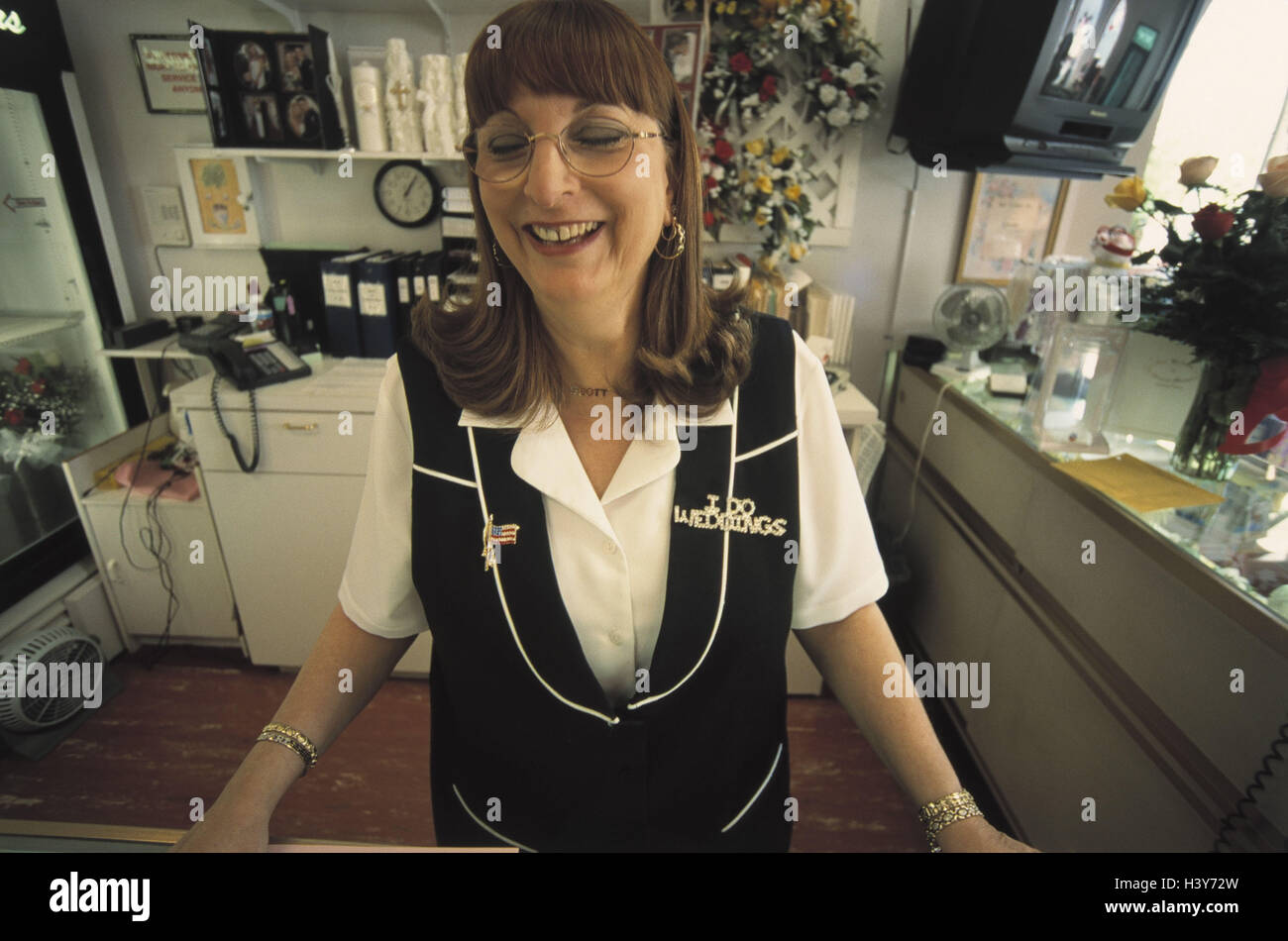 The USA, Nevada, Las Vegas, Wedding Chapel, reception desk, woman ...