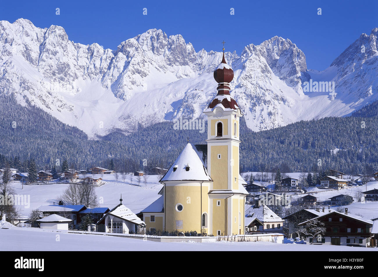 Austria, Tyrol, Going, local view, parish church, Wilder Kaiser, winter ...