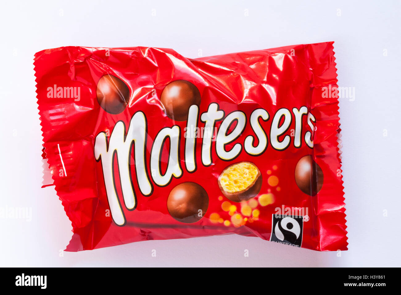 Packet of fun size chocolate Maltesers isolated on white background ...