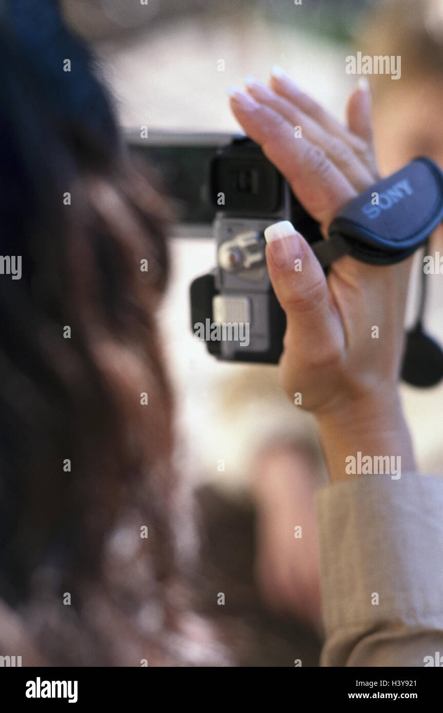 Nut, video camera, back view, children, film, outside, town, woman ...