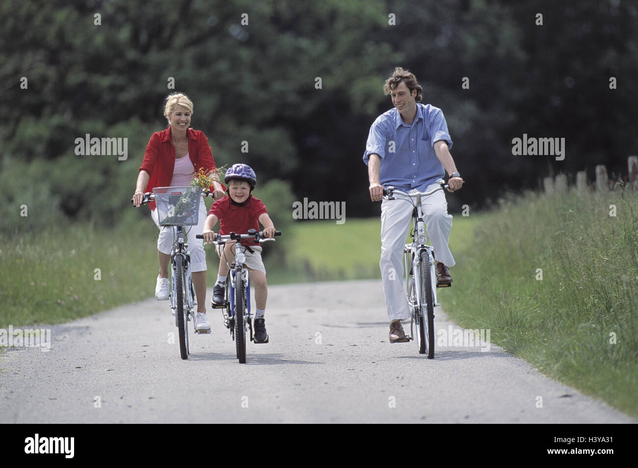Family, ride of a bike, happy, parents, child, boy, bicycles, cyclists ...