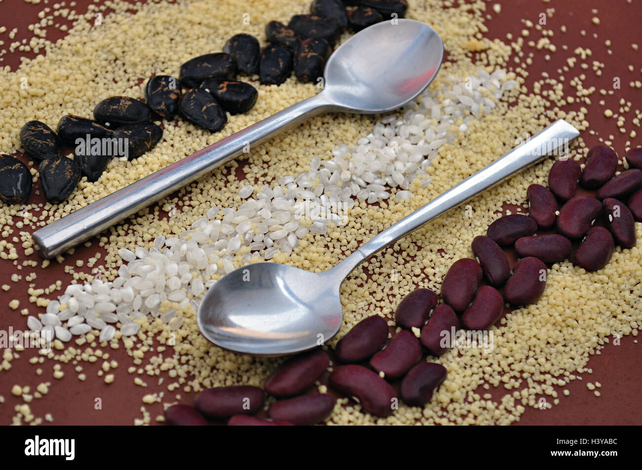 couscous and colored seeds Stock Photo - Alamy