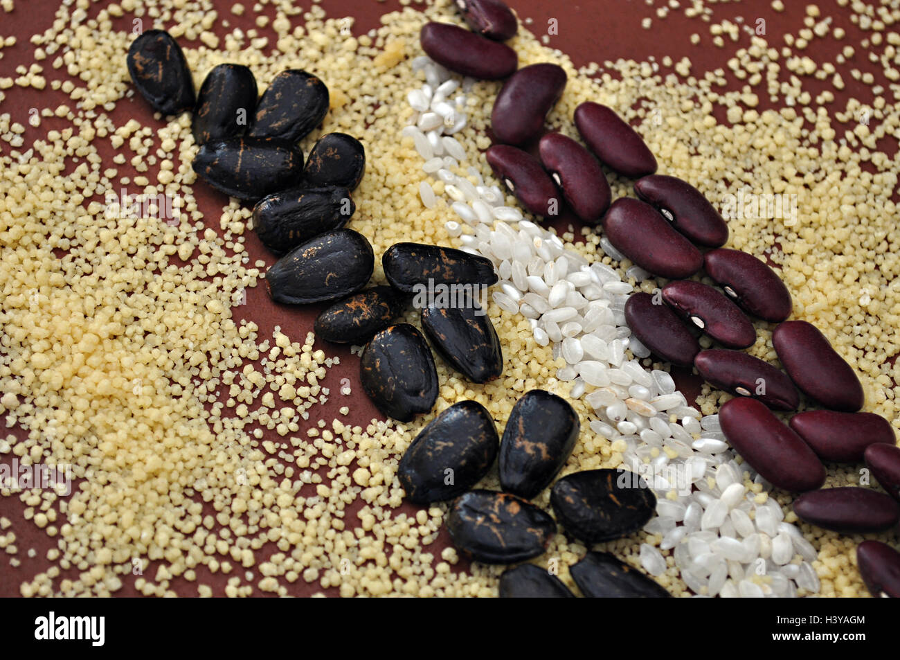 couscous and colored seeds Stock Photo - Alamy