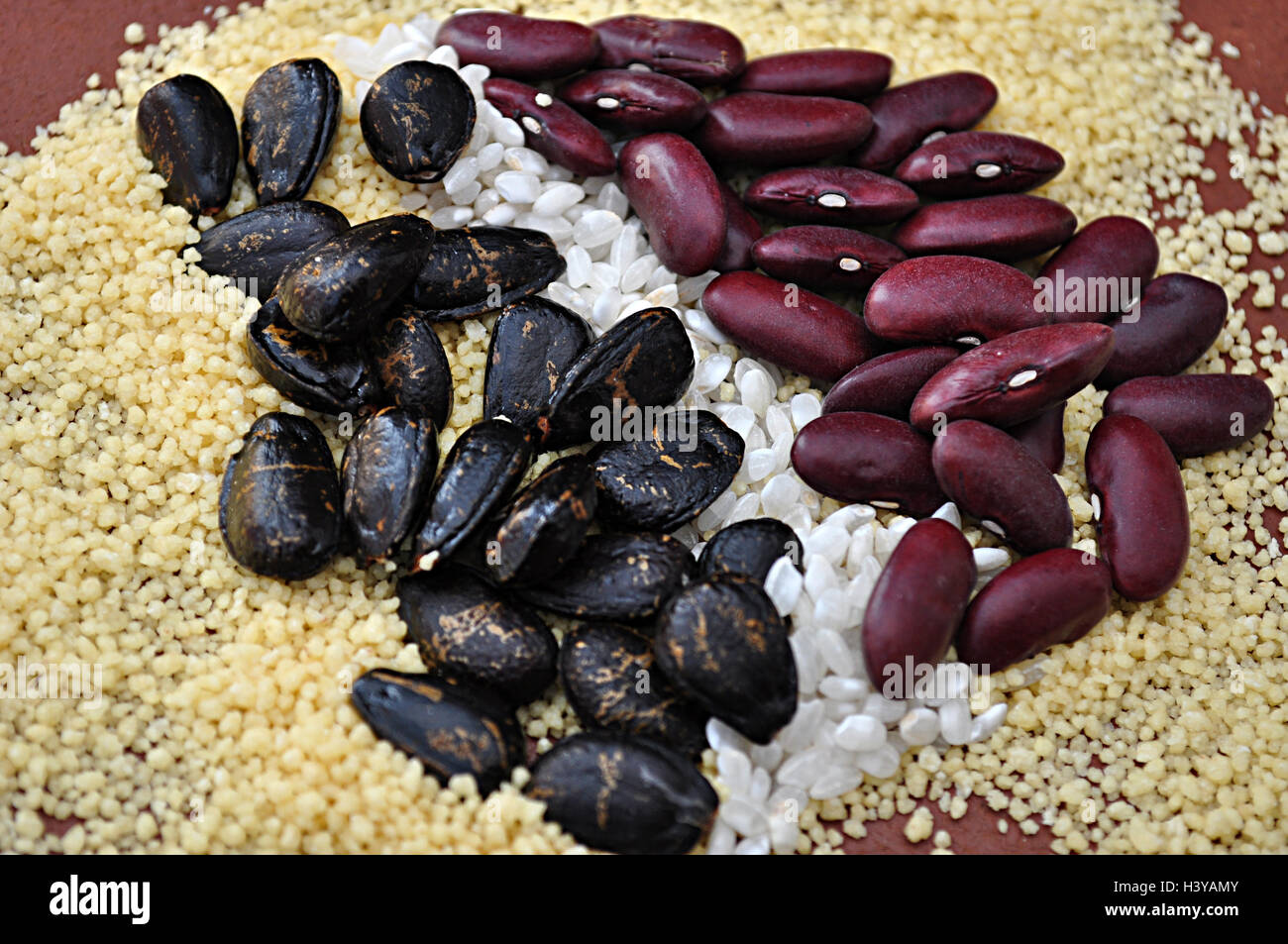 couscous and colored seeds Stock Photo - Alamy