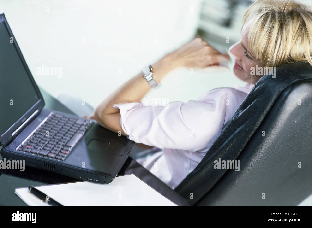 Businesswoman, leant back, laptop, detail, inside, workplace, office ...