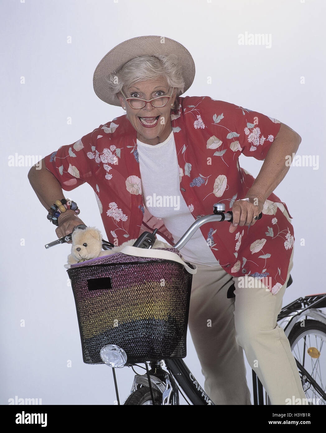 Senior, riding of a bike, facial play, enterprise joy studio, cut out ...