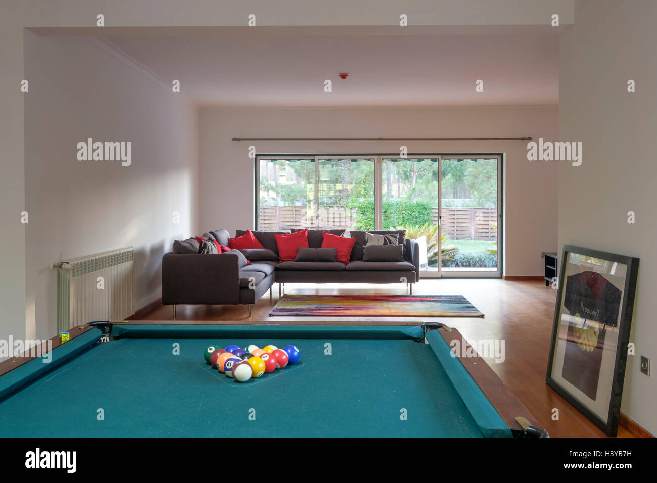 Billiards table in game room at home Stock Photo - Alamy