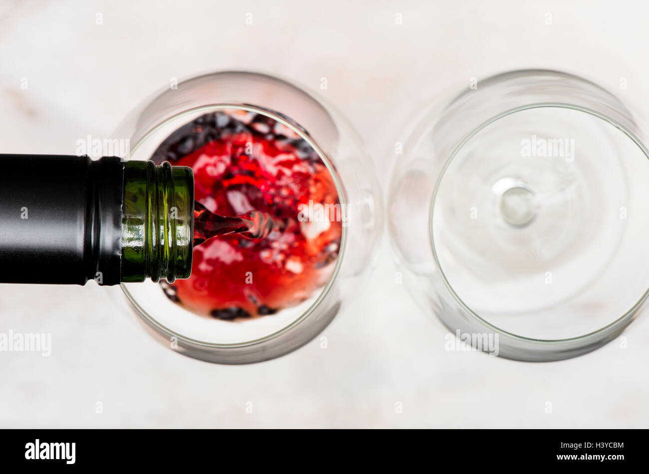 Glass pouring bottle above pour party hi-res stock photography and ...