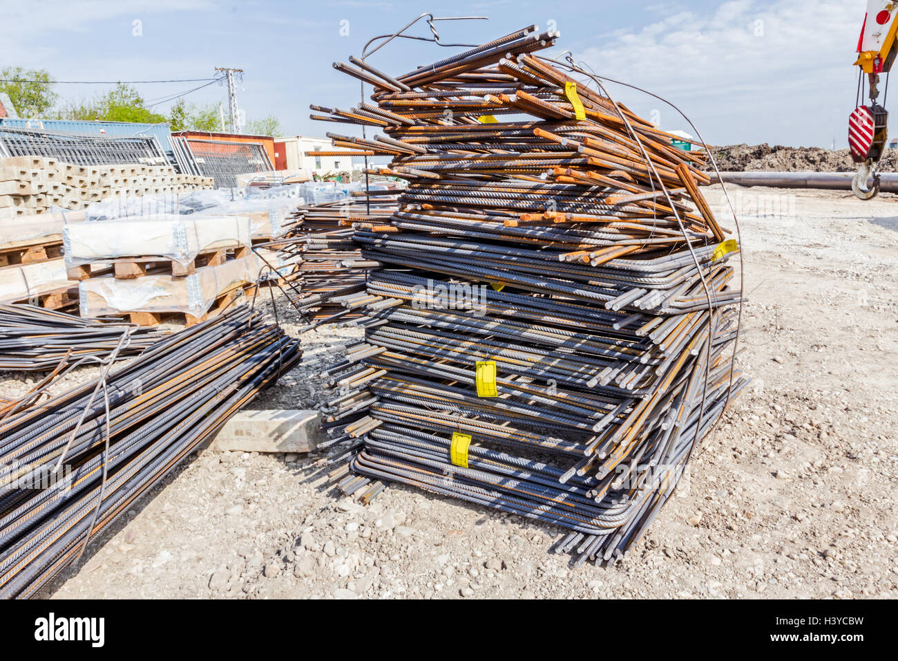 Steel bars stacked for construction, classified by the bending shape at ...