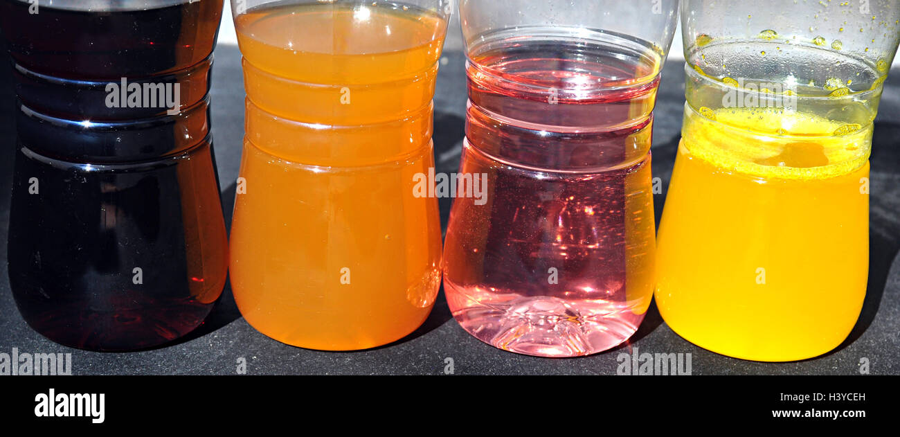 plastic bottles with colored liquid Stock Photo - Alamy