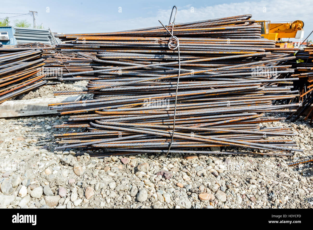 Steel bars stacked for construction, classified by the bending shape at ...