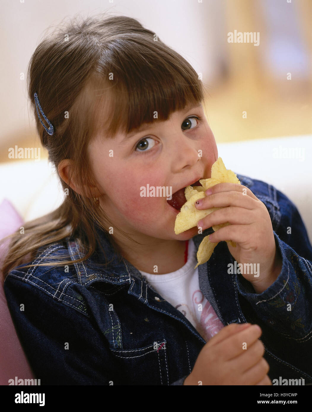 Girls, crisps, eat, portrait, sit inside, at home, child, long-haired ...