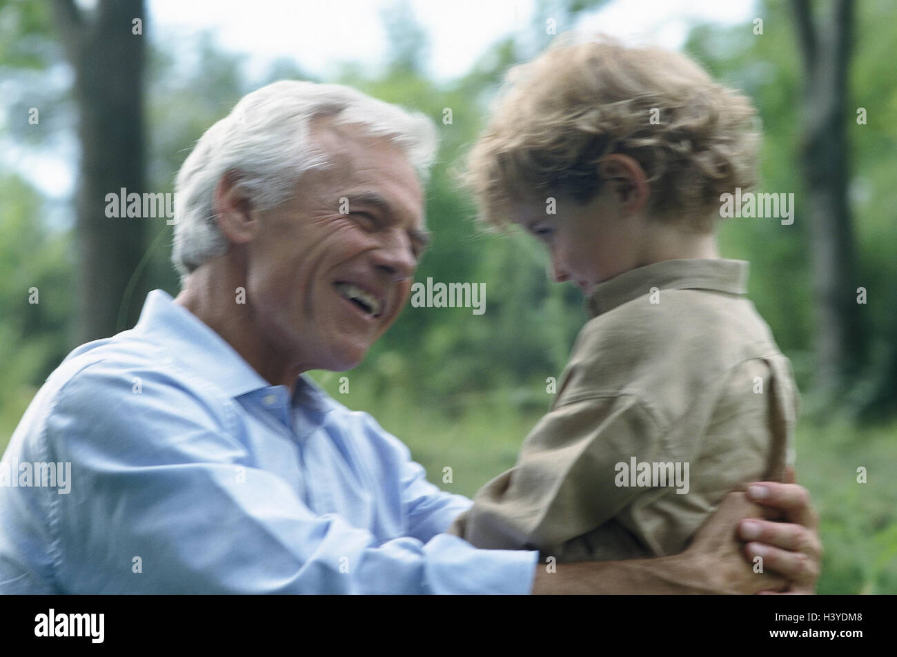 Grandfather, grandson, conversation, eye contact, page portrait, blur ...