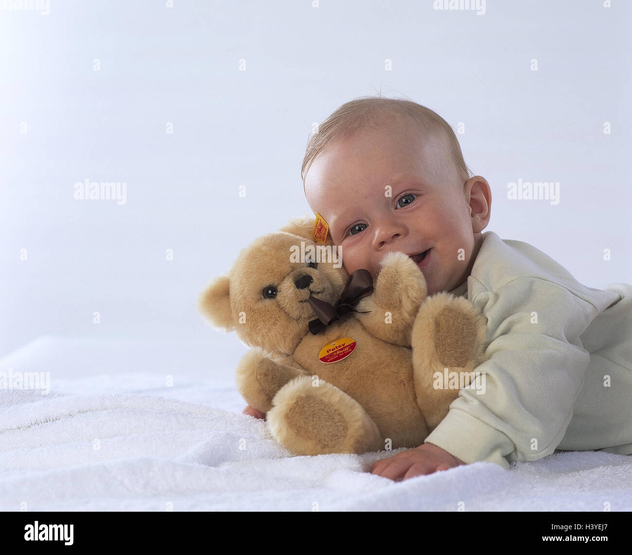 Caps, baby, happy, Teddy, abdominal position inside, studio, child ...