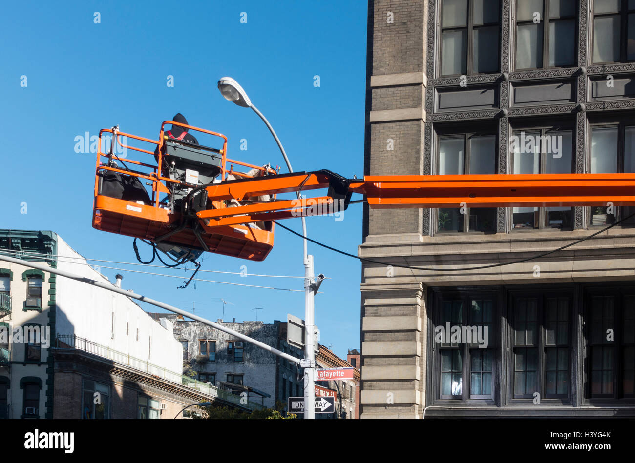 Cameraman on cherry picker hi-res stock photography and images - Alamy