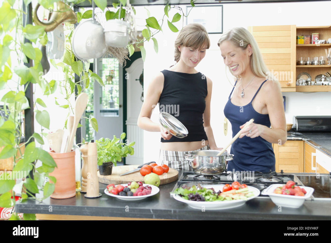 Cuisine, women, cook, together, fun, at home, friends, two ...