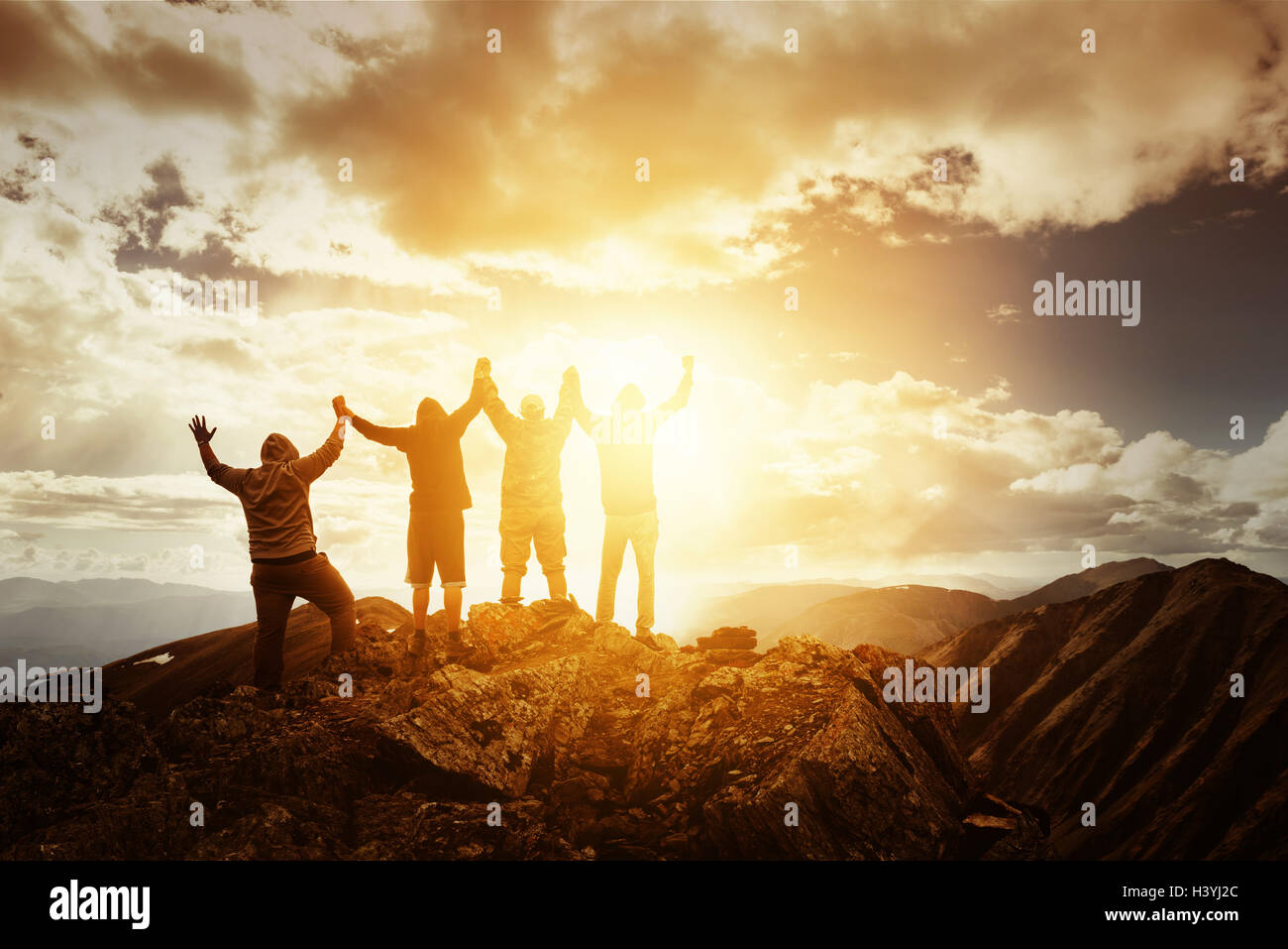 Group people winner win mountain concept Stock Photo - Alamy