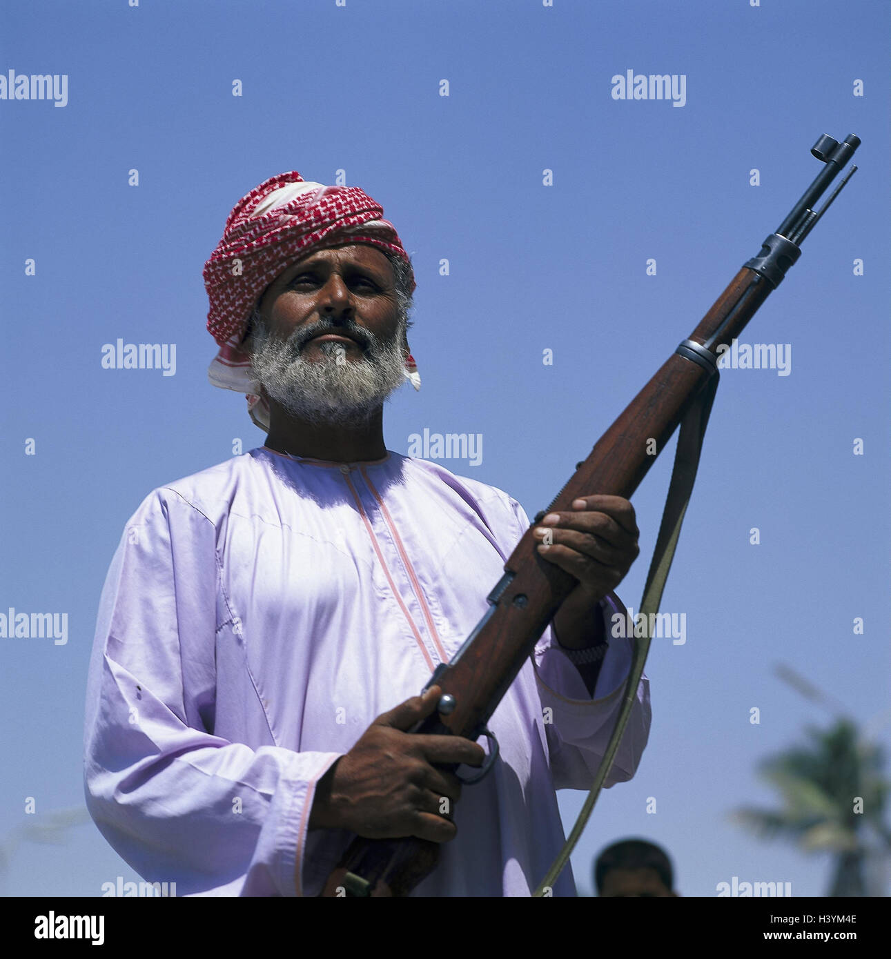 Oman, Salalah, man, gun, half portrait, Arabia, Arabian peninsula ...