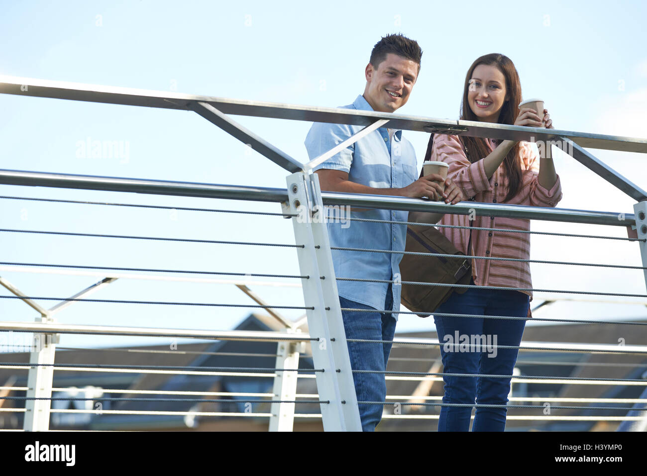 Female looking over bridge hi-res stock photography and images - Alamy