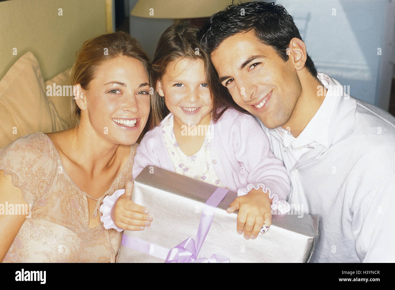 Parents, subsidiary, present, happy, portrait, model released, family ...