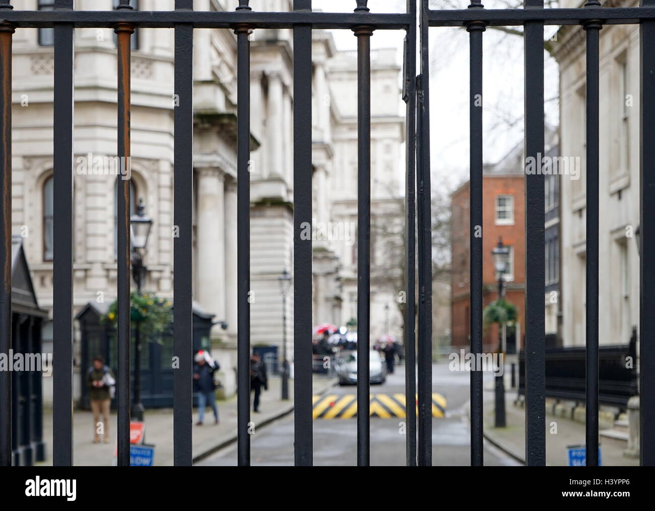 Security gates with raised road ramp at the entrance to Downing Street ...