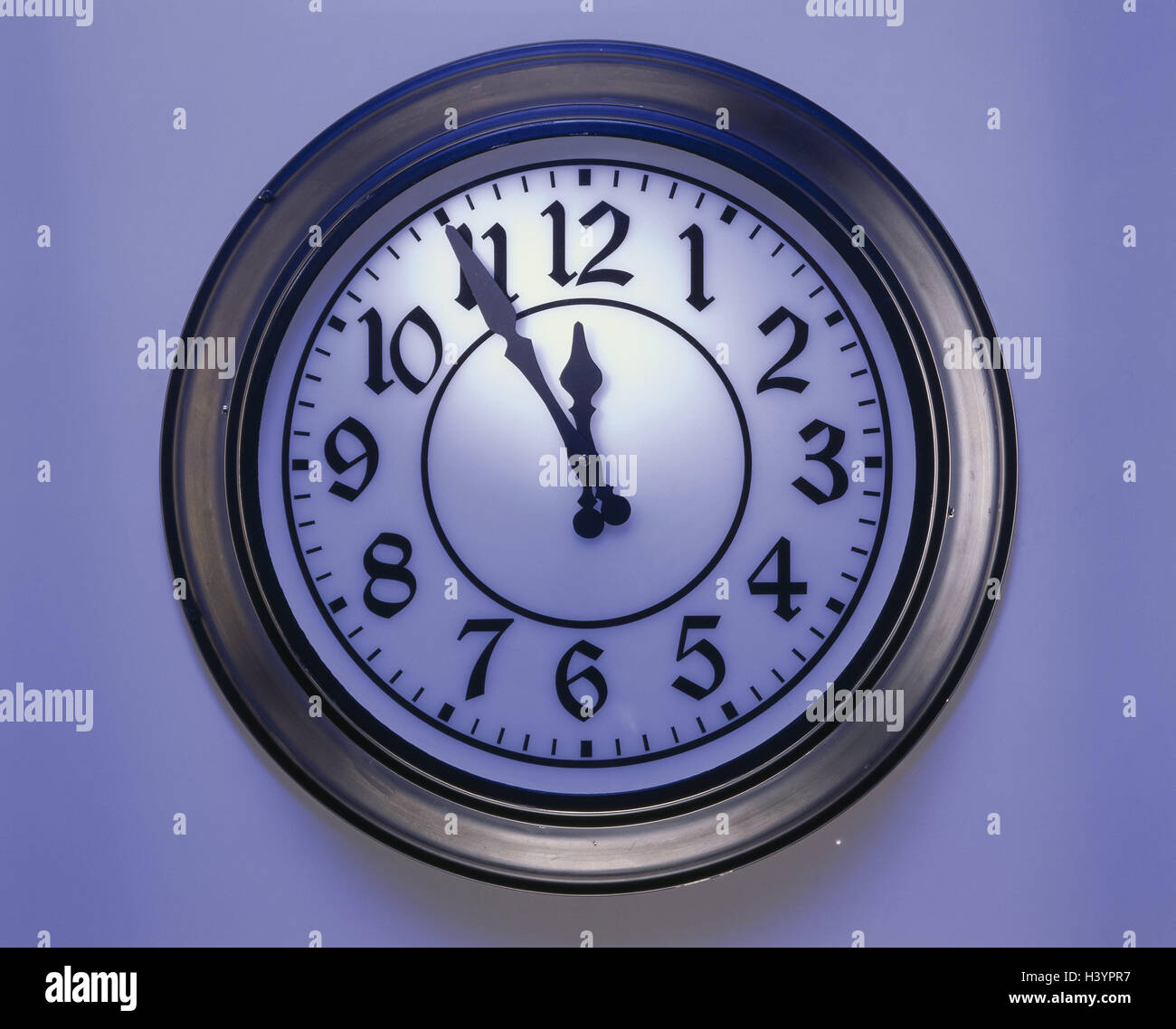 Culinary clock, "Five in front of twelve Stock Photo - Alamy