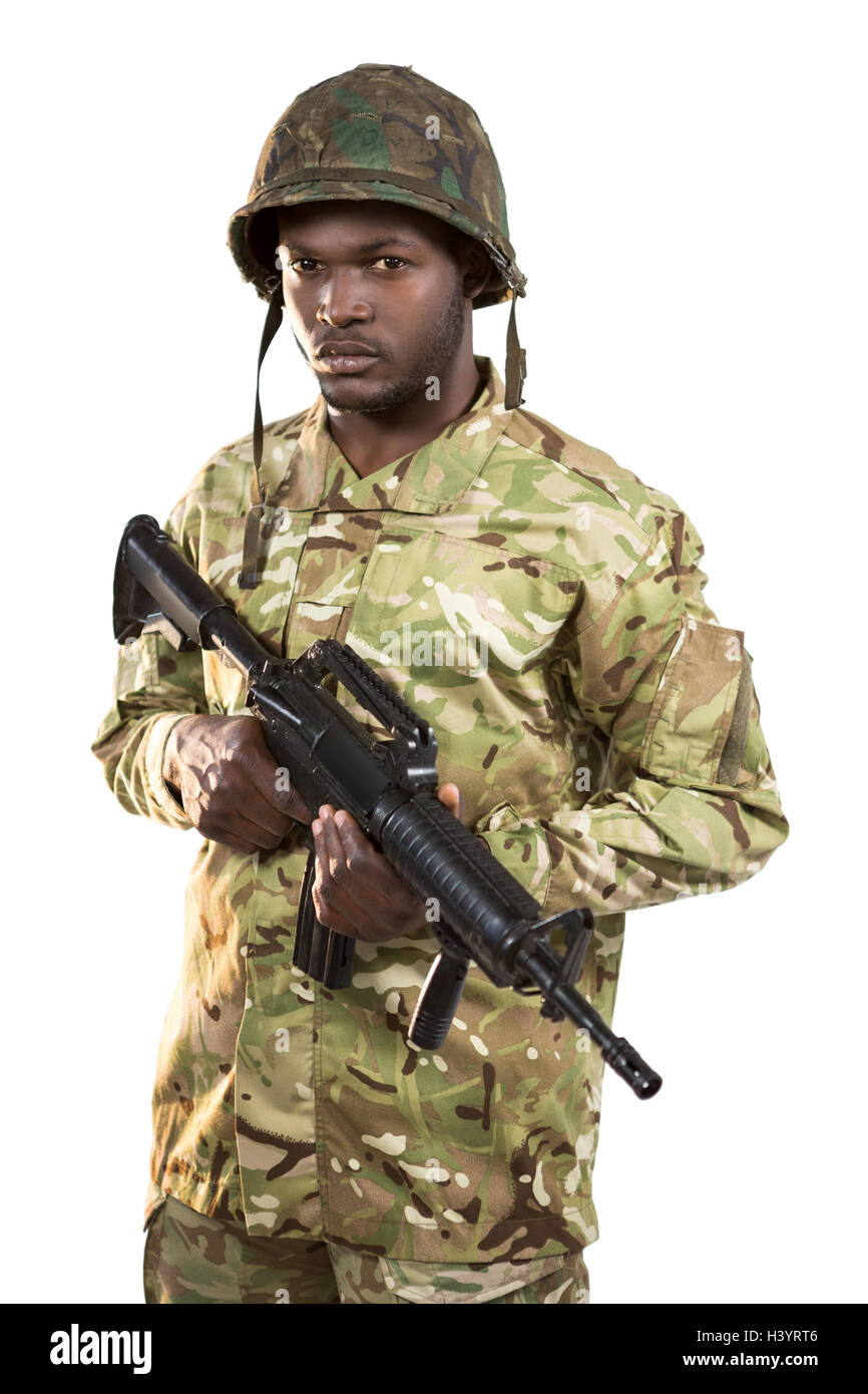 Portrait of soldier holding a rifle Stock Photo - Alamy