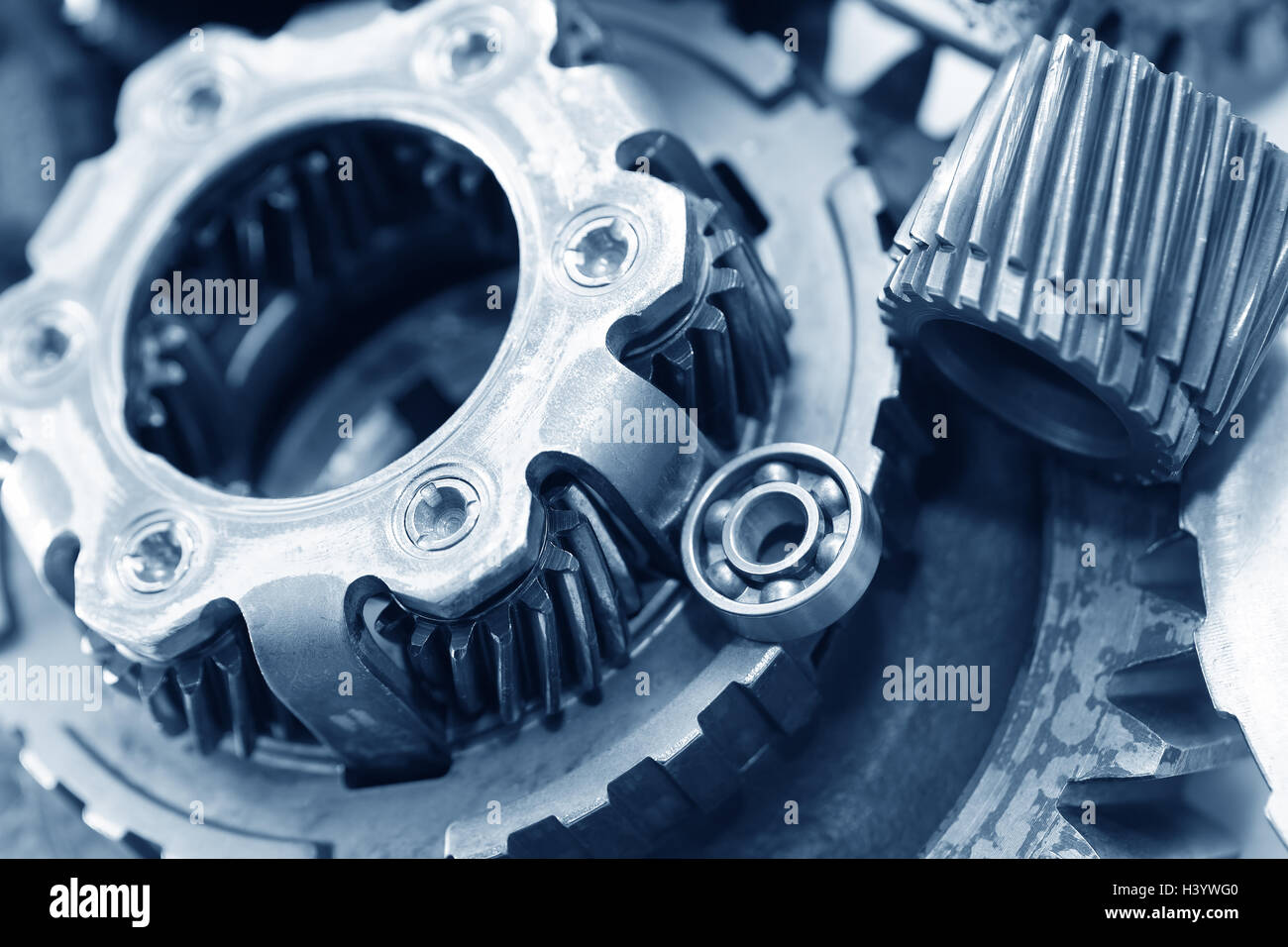 Machinery concept. Set of various gears closeup as background Stock ...