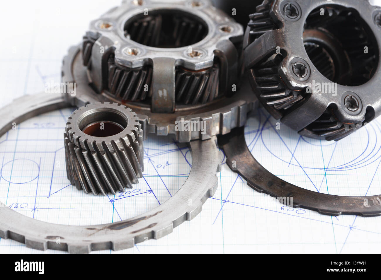 Engineering concept. Set of gears on blueprint Stock Photo - Alamy