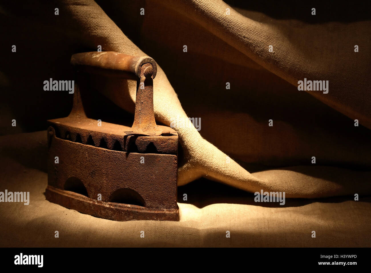 Old rusty iron on background with canvas Stock Photo - Alamy