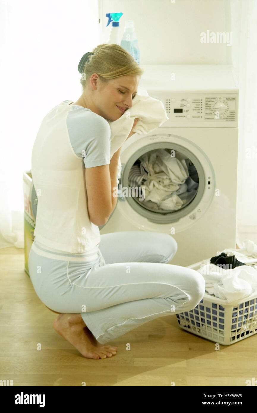 Wascher driers, woman, smile, laundry piece, nestle up housewife, young ...
