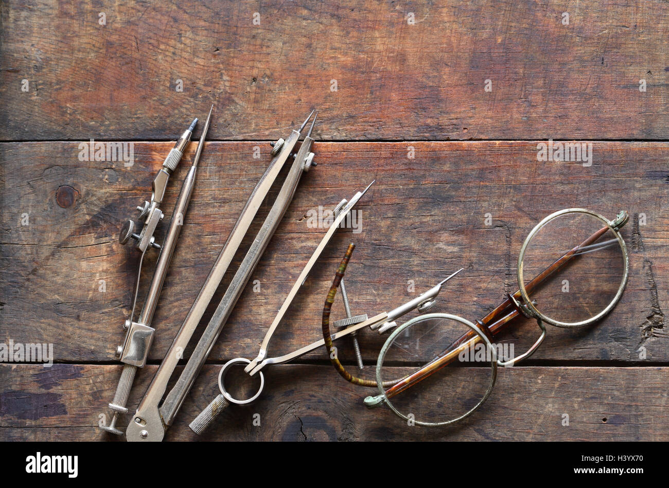 Set of vintage drawing instrument on old wooden background Stock Photo ...