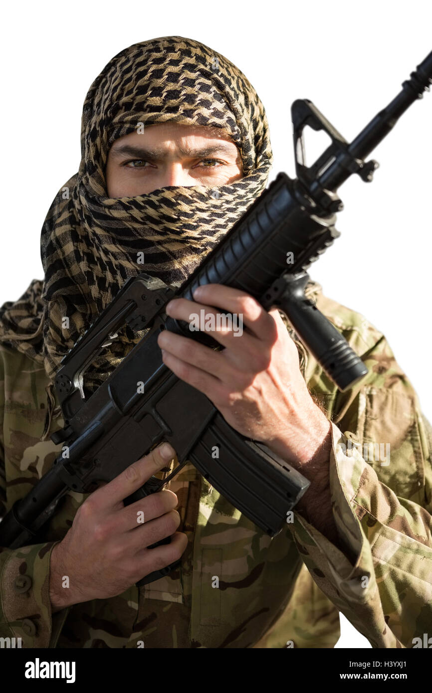 Portrait of soldier holding a rifle Stock Photo - Alamy