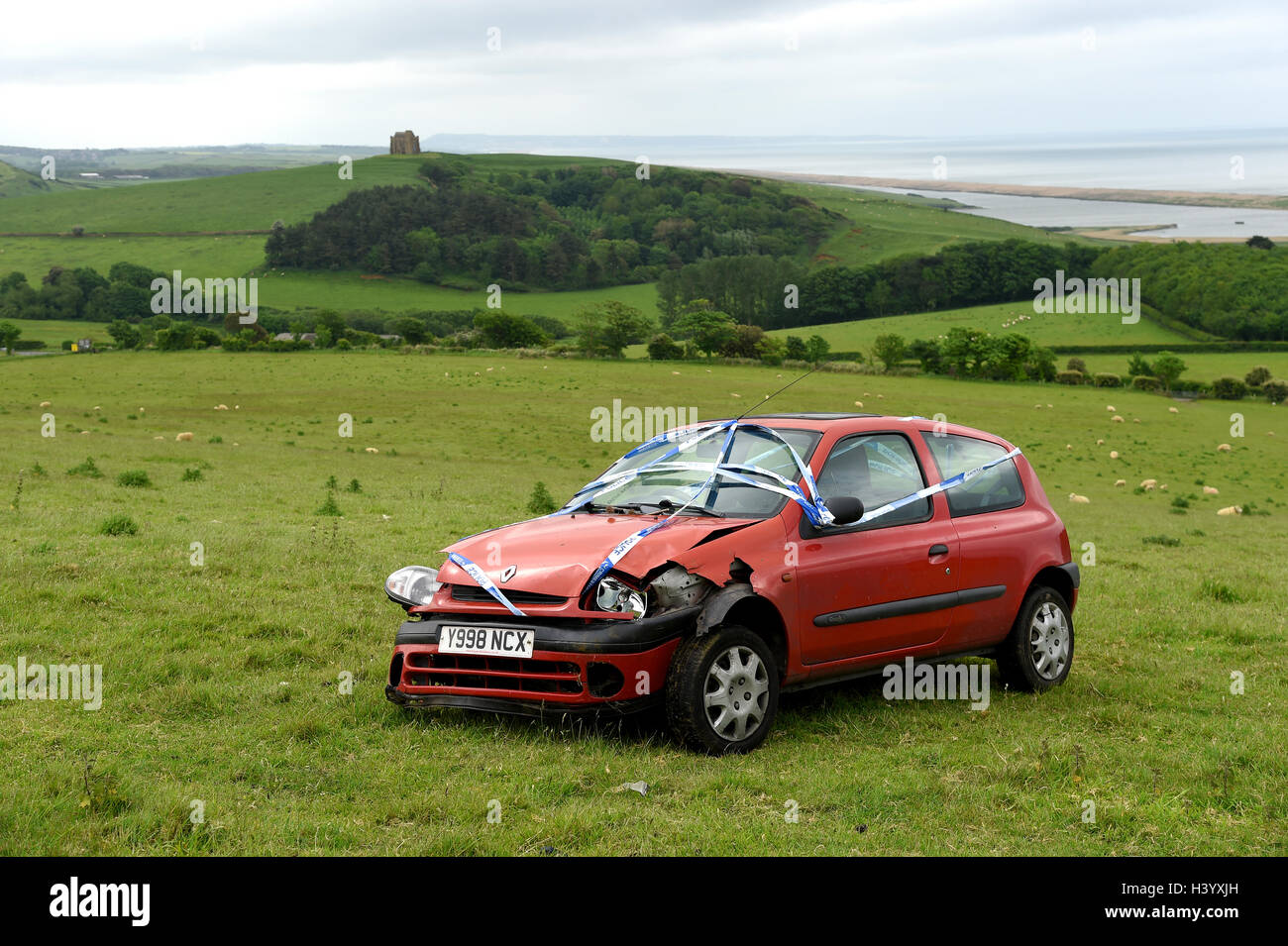 Car wreck in a field, UK, car crash, crashed vehicle, automobile ...