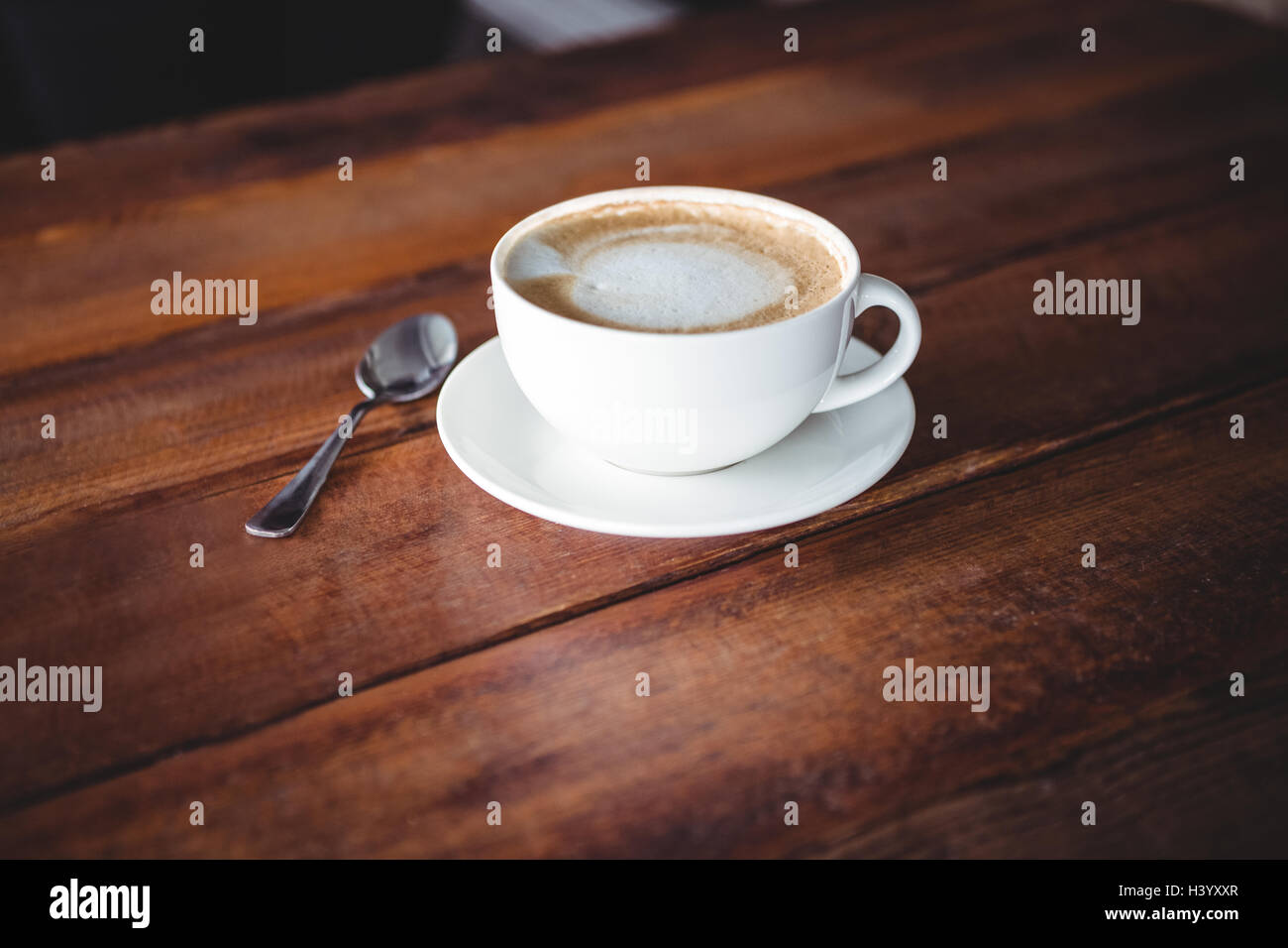 Coffee cup on a table Stock Photo - Alamy