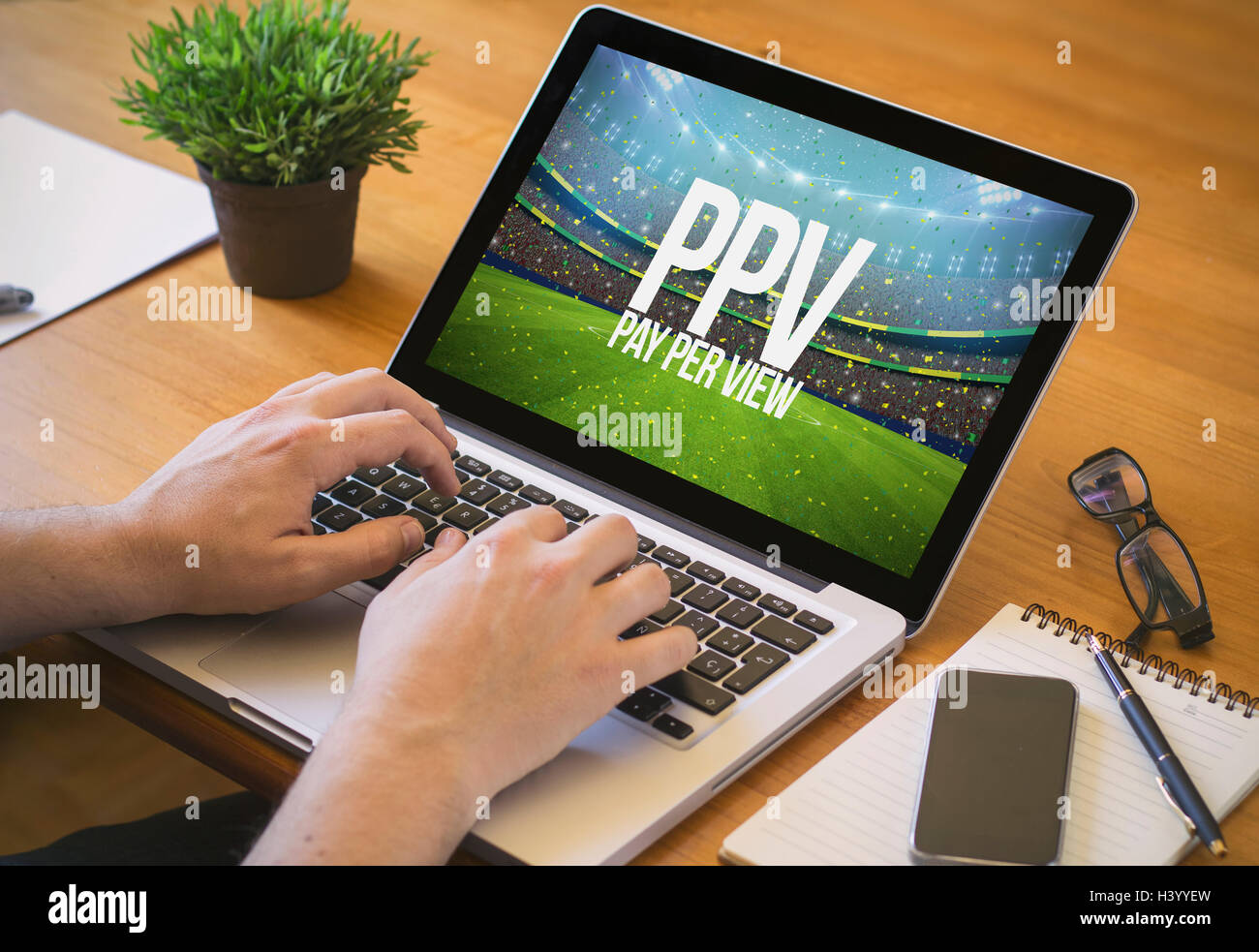 pay per view concept. Close-up top view of a man watching sports event ...