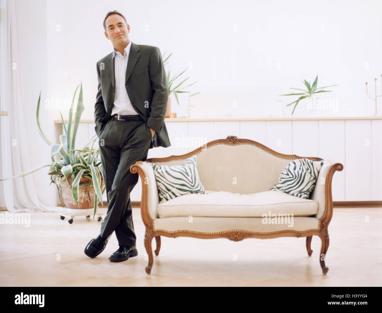 Living space, sofa, man, young, suit, wait, stand patiently, 25-35 ...