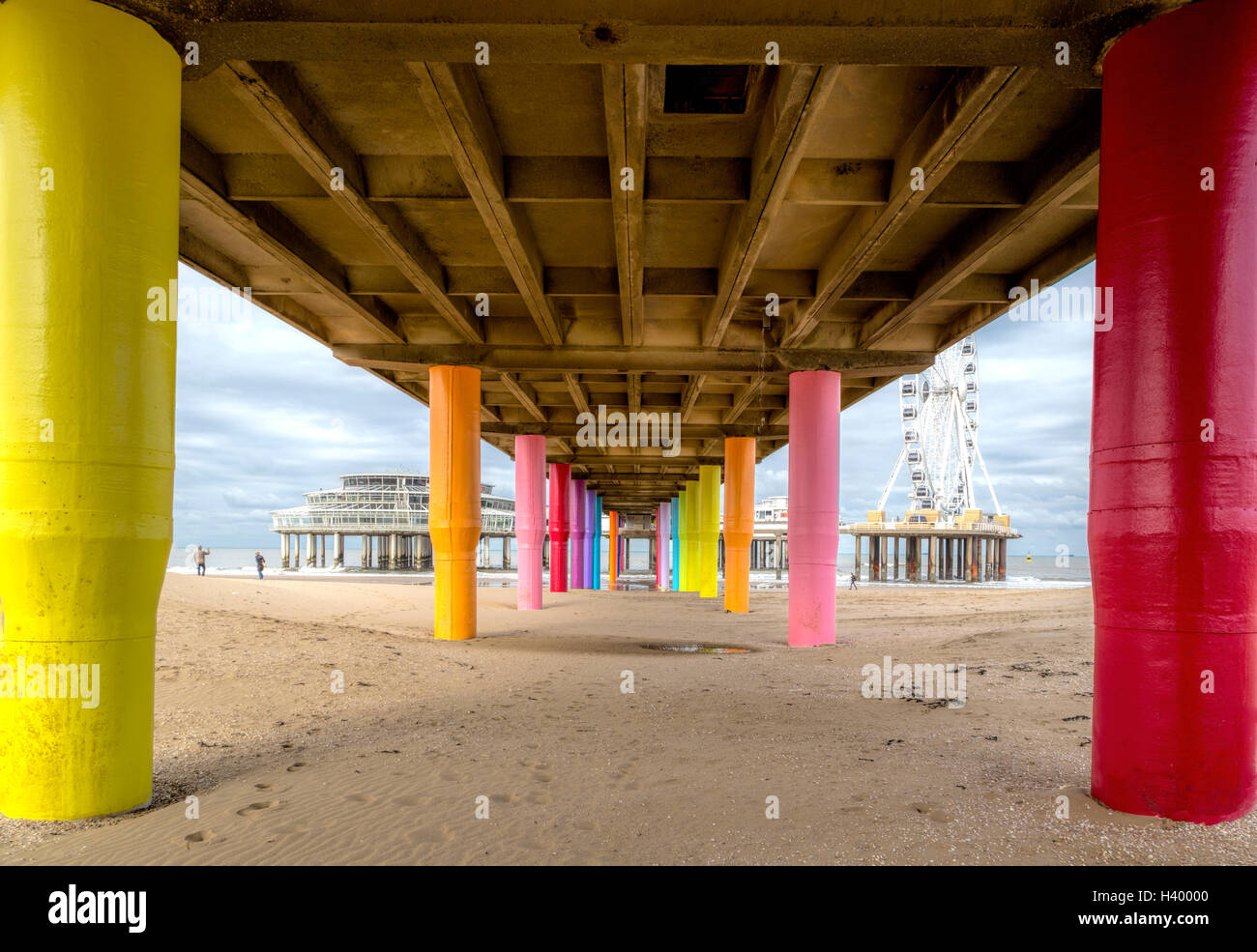 Low angle view on Scheveningen Pier with its colorful pillars, on the ...