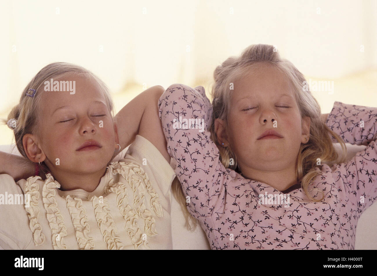 Two girls lean back back hi-res stock photography and images - Alamy