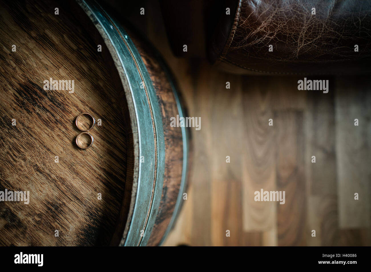Wedding rings on a wooden barrel Stock Photo - Alamy
