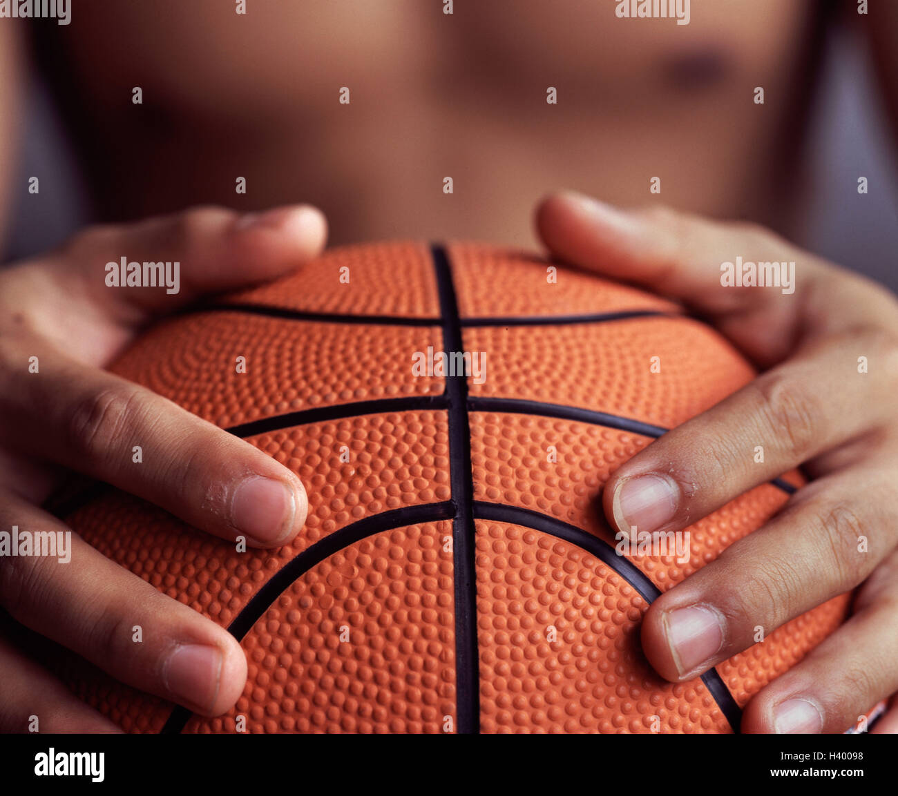 Man, young, free upper part of the body, detail, hands, basketball ...
