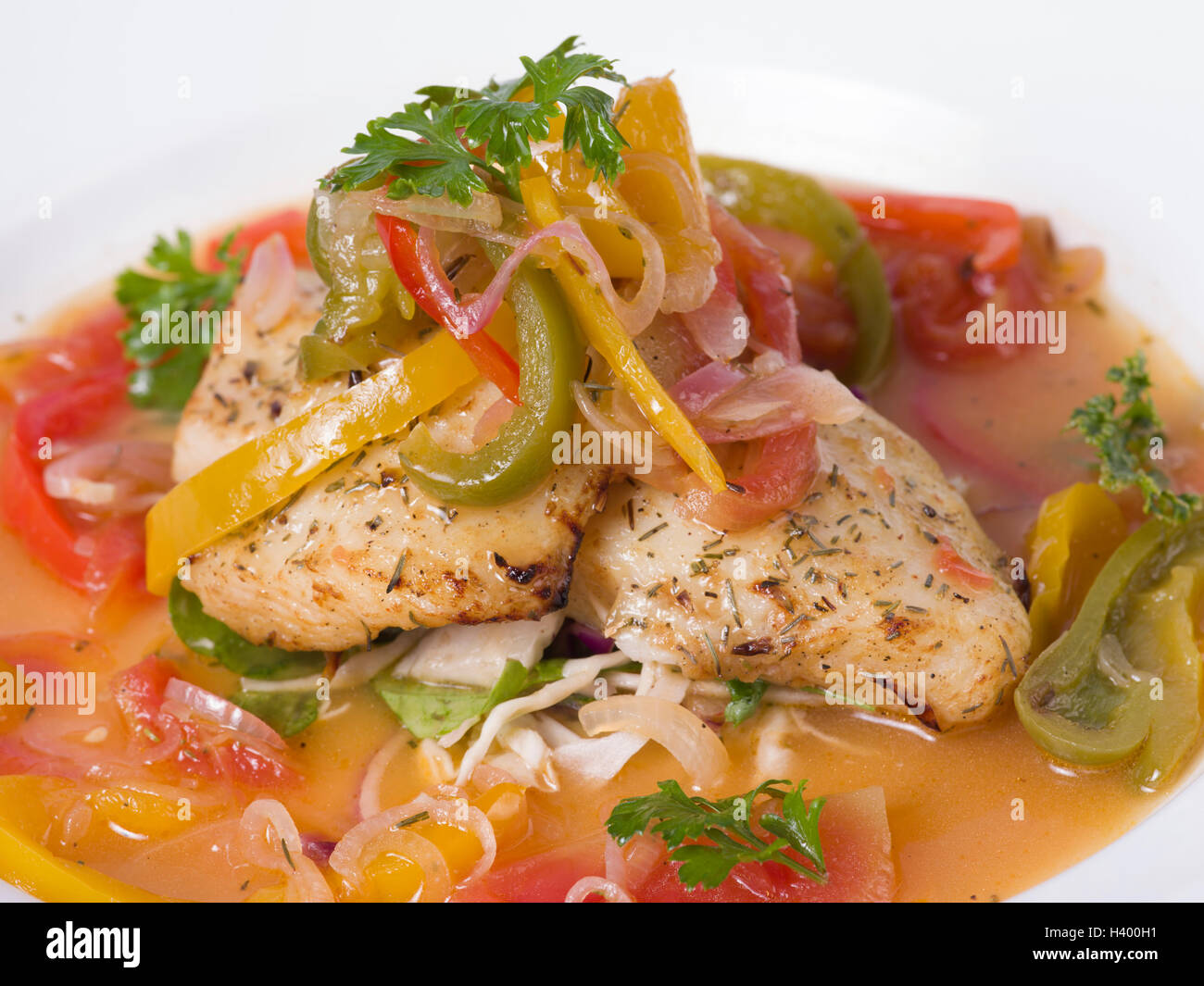 Fish escabeche served in a bowl Stock Photo - Alamy