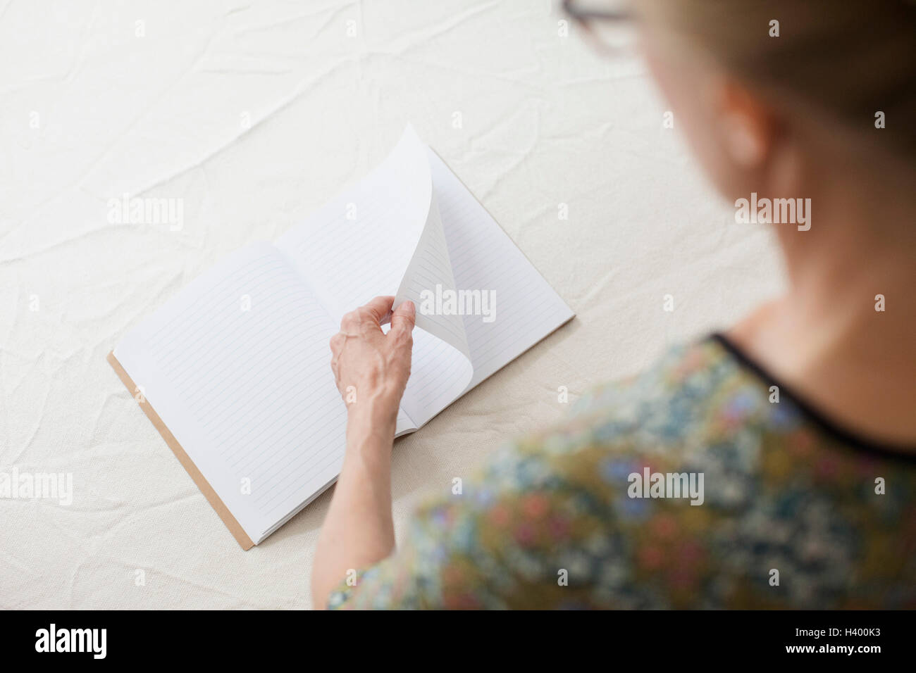 One book on table hi-res stock photography and images - Alamy