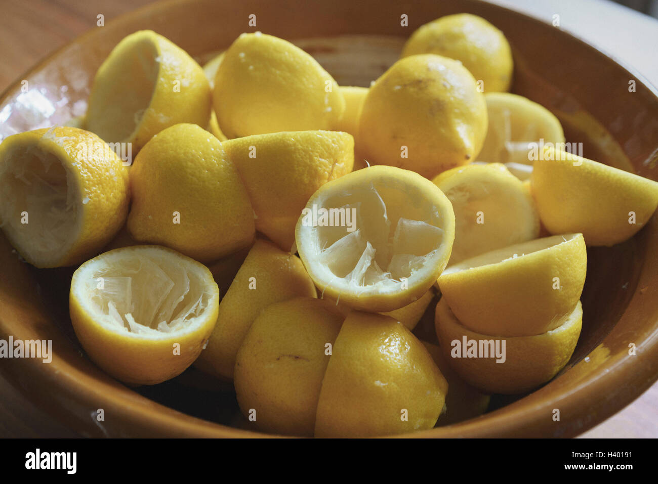 Close-up of juiced lemon halves on plate Stock Photo - Alamy