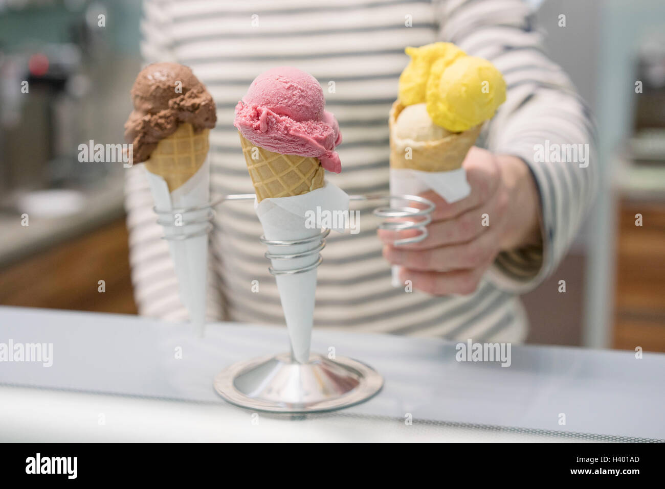 Man eating ice cream cone hi-res stock photography and images - Alamy