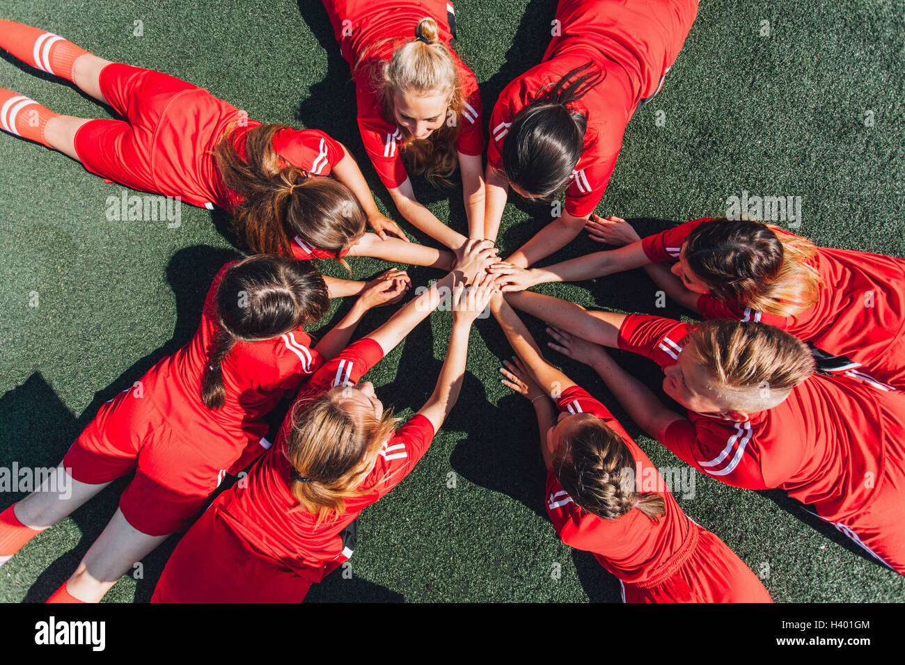Stacking hands hi-res stock photography and images - Alamy